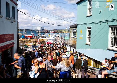 Falmouth, UK. 14th June 2025. Spectators watch performances on stage at ...