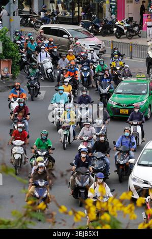 Saigon Street Life. A rush hour motorcycle swarm in Ho Chi Minh City ...