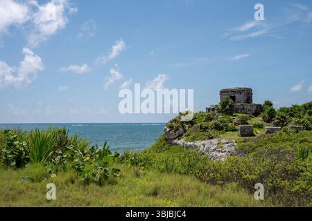 Temple of the Wind God overlooking turquoise Caribbean sea with lush ...