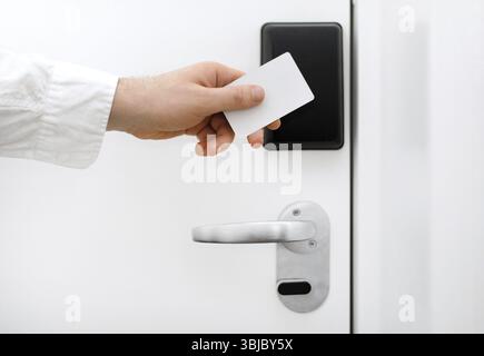 Man using contactless key in the hotel Stock Photo - Alamy