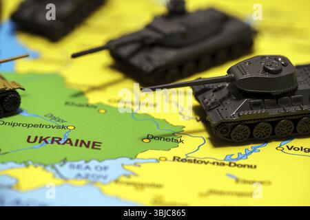 Toy tanks on the map. Military operations in Ukraine Stock Photo - Alamy
