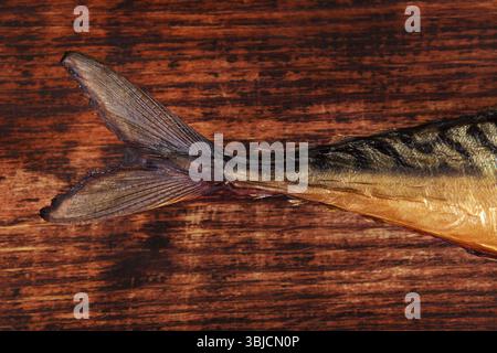 Smoked mackerel on wooden background Stock Photo - Alamy
