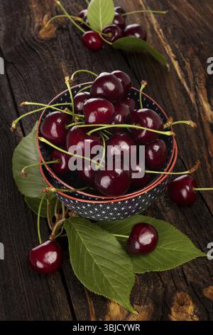 Fresh ripe appetizing cherry in crates, warehouse at factory Stock ...