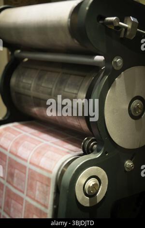 Old money printing machine in a museum Stock Photo - Alamy