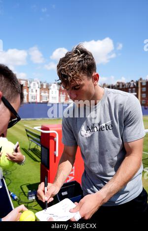 Jack Draper signs autographs during a training session on day three of ...