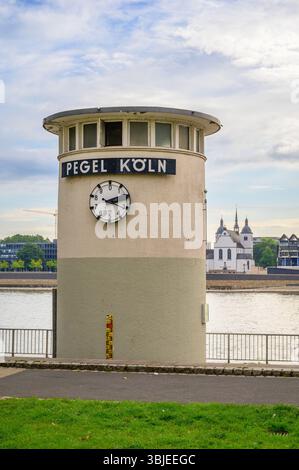 Bright day at Pegel Koln water level gauge tower in Cologne, Germany ...