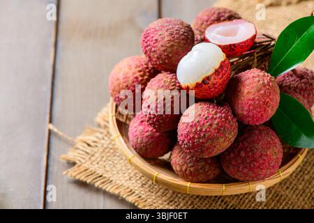 Juicy Fresh Lychee in Bamboo Basket on Rustic Wooden Table – Tropical ...