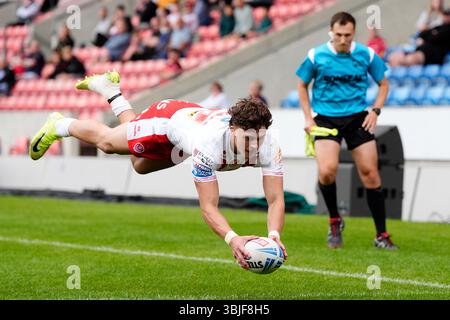 St Helen's Owen Dagnall scores their second try during the Betfred ...