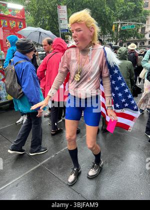 Protestors march in the "No Kings" protest in Times Square, New York on ...