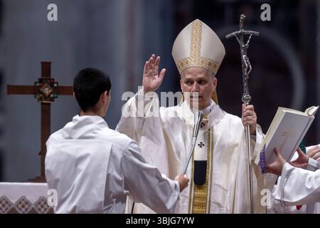 Pope Leo XIV gives his blessing during a Mass for the Commemoration of ...