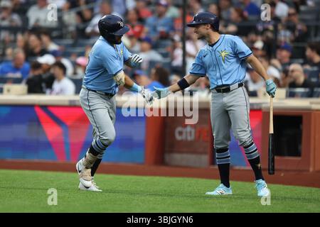 Tampa Bay Rays' Jonathan Aranda, right, celebrates his single during ...