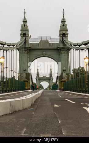 Hammersmith Bridge is a suspension bridge that crosses the River Thames ...