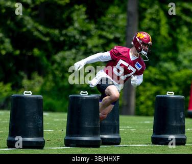 Washington Commanders linebacker Nick Bellore (57) celebrates during an ...