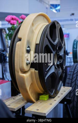 A run-flat tire insert, a specialized support structure, fitted inside ...