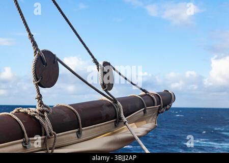Folded sail and mast on an old sailboat Stock Photo - Alamy