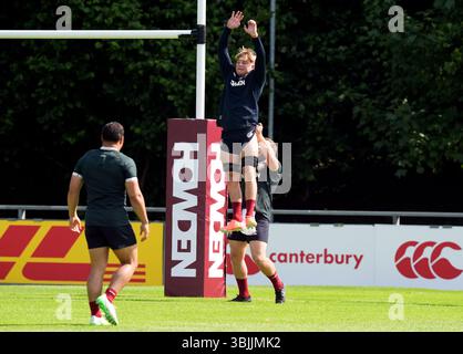 Henry Pollock of the British & Irish Lions regathers the ball as he ...