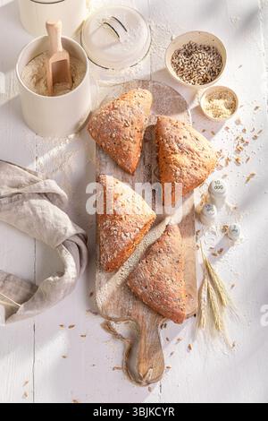 Healthy and fresh triangular buns baked in a bakehouse. Triangular buns ...
