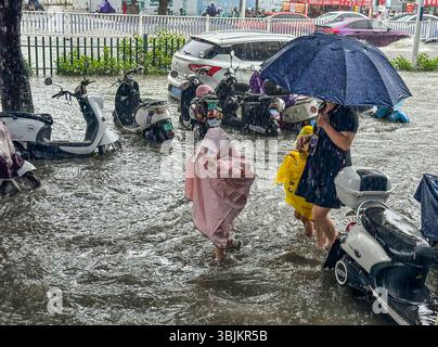 NANNING, CHINA - JUNE 16, 2025 - Vehicles were driving in the ...