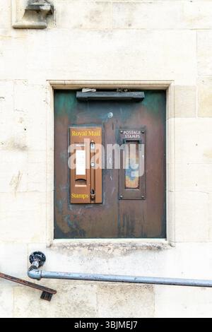 Old postage stamp vending machine Stock Photo - Alamy