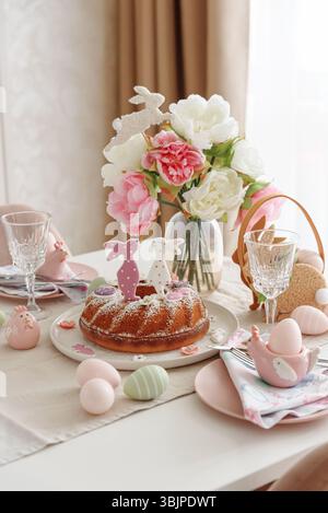 Easter table setting with cookie in shape of rabbit Stock Photo - Alamy