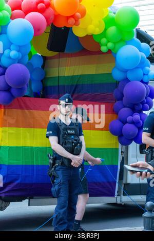 Police officers stand guard in front of Peace Memorial Park in ...