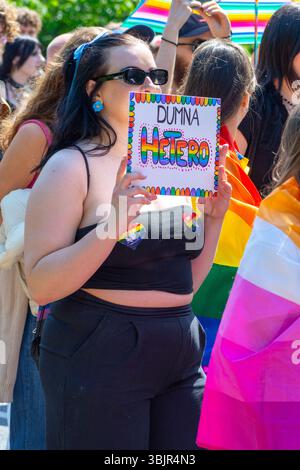 A participant holds a rainbow flag during the Kolkata Rainbow Pride ...