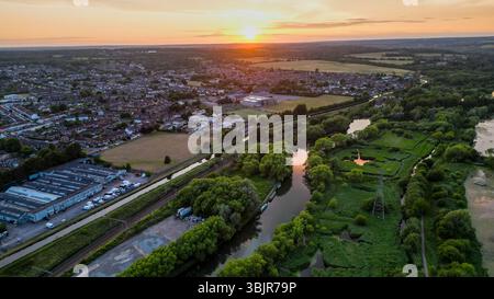 Aerial view of Hoddesdon, Hertfordshire showing river, sunset and ...