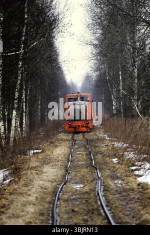old very dangerous rickety railroad. train rides on rails deformed ...