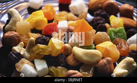 Tutti frutti. Mix of dry fruits (raisins, citron, mango) and nuts ...