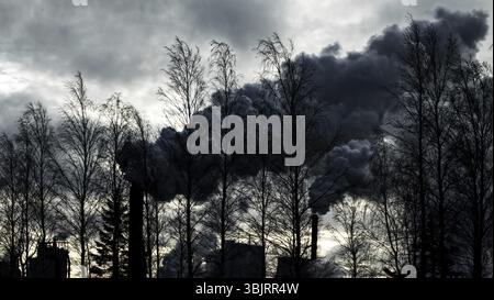 Thick clouds of dirty smoke from plant pollute atmosphere. Problems of ...