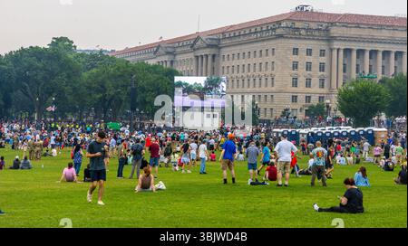 Spectators watch the Washington Pride parade, Saturday, June 20, 2026 ...