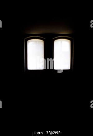 Architecture detail dark windows two story townhouse Stock Photo - Alamy