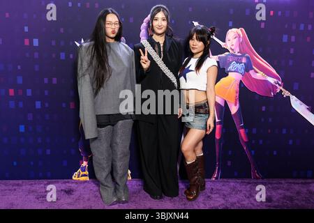 EJAE, Rei Ami, and Audrey Nuna of HUNTR/X onstage during the 2025 MTV ...