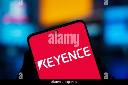 Dhaka, Bangladesh- 10 Dec 2024: Keyence logo is displayed on smartphone ...