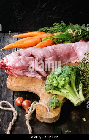 Raw whole rabbit Stock Photo - Alamy