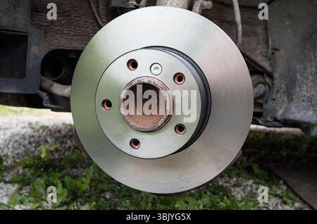 Disc is ready for repair. Car brake system Stock Photo - Alamy