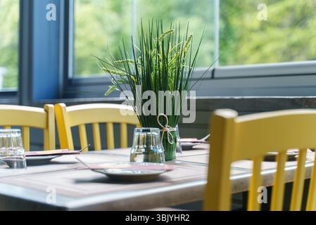 Setout table with tableware in modern restaurant in summer Stock Photo ...
