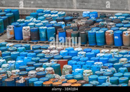 Photo of a Chemical waste dump with a lot of barrels Stock Photo - Alamy
