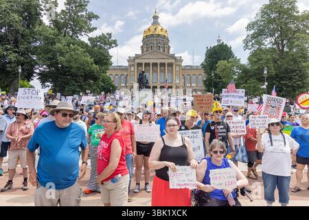 Thousands of people held a “No Kings” rally at the state capitol in Des ...