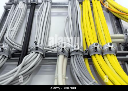 Clean Industrial cables on the wall Stock Photo - Alamy