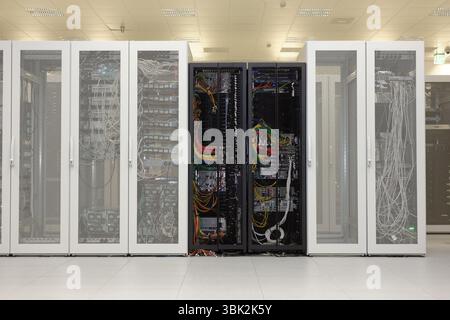 Clean industrial interior of a server room with servers Stock Photo - Alamy