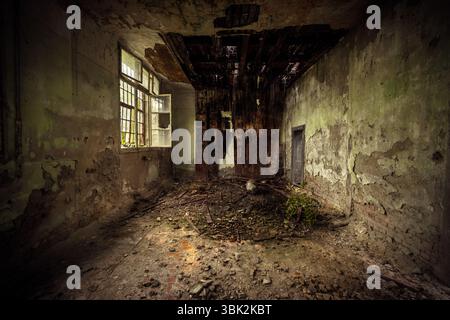 Dark damaged room interior with bad rooftop Stock Photo - Alamy