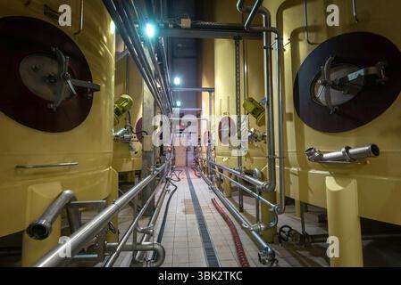 Industrial interior with welded silos angle shot Stock Photo - Alamy