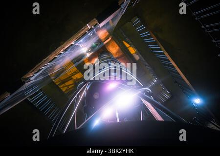 Clock tower interior with elevator angle shot Stock Photo - Alamy