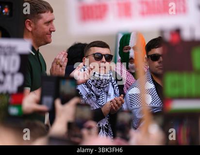 JJ O'Dochartaigh (DJ Provai) from Kneecap wearing balaclava in the ...