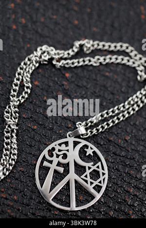 Pendant with symbols of major religions. Christianity, Judaism ...