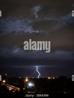 Lightning Strikes at night in a Tropical Storm Stock Photo - Alamy