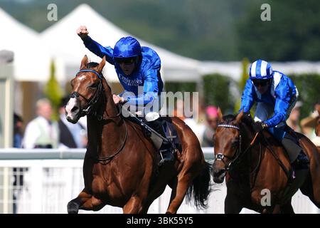 Ombudsman ridden by William Buick (left) on their way to winning the ...