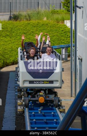 Poitiers, France. 15th June, 2025. Visitors enjoy the many rides and ...