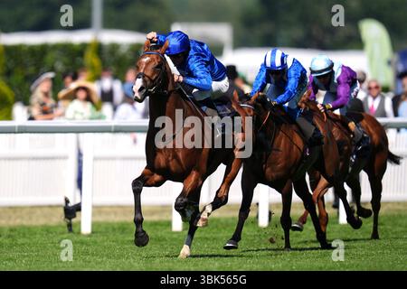 Ombudsman ridden by William Buick (left) on their way to winning the ...